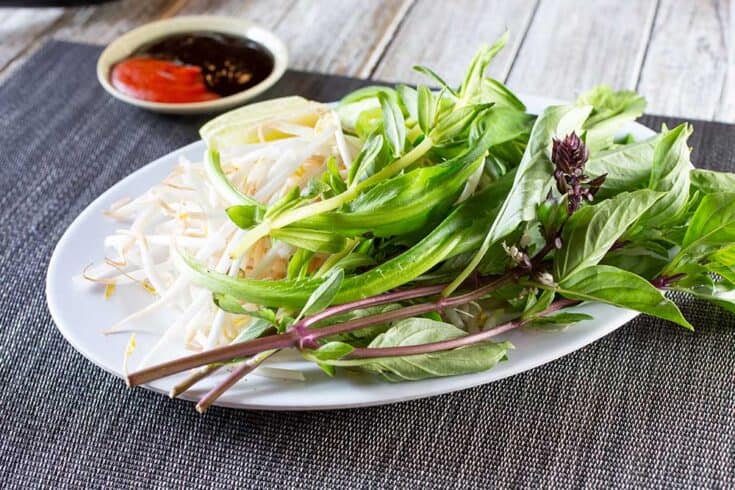 What are the herbs in Vietnamese pho garnish plates?